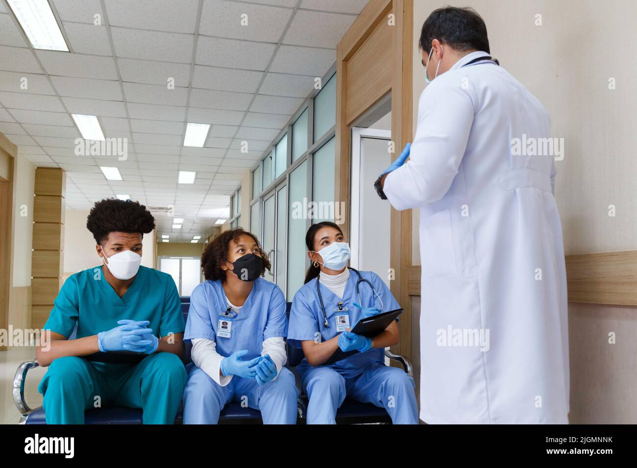 professor doctor give advice and discuss with intern student team for ...