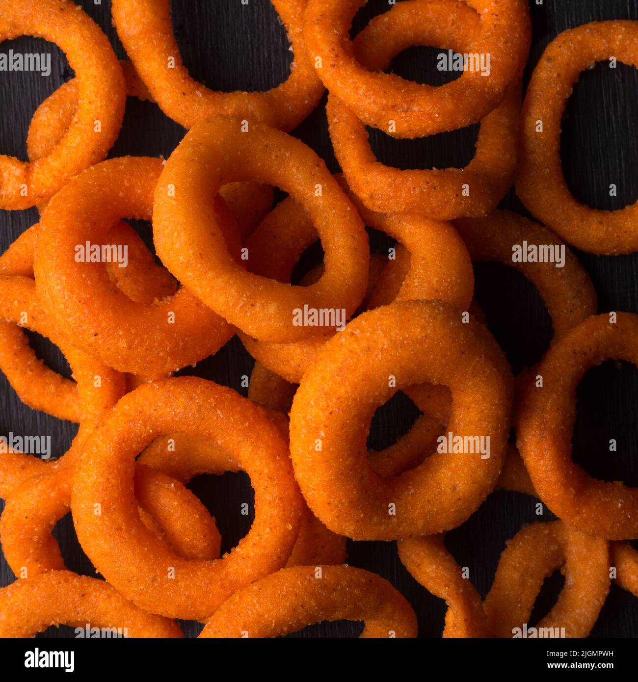 heap of crispy doughnut or donut, crunchy deep fried snack variety ...