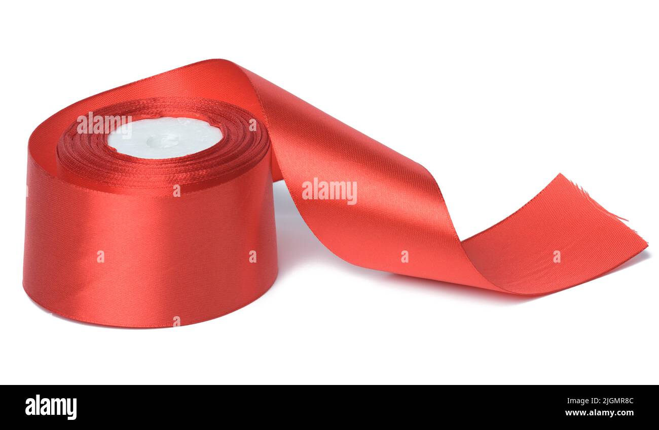 Roll of silk red ribbon, wrapping decor, white isolated background ...