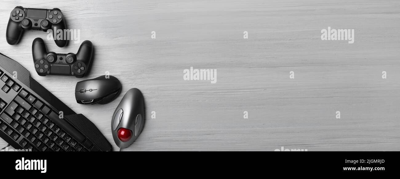 Modern gaming accessories on wooden background with space for text Stock Photo - Alamy