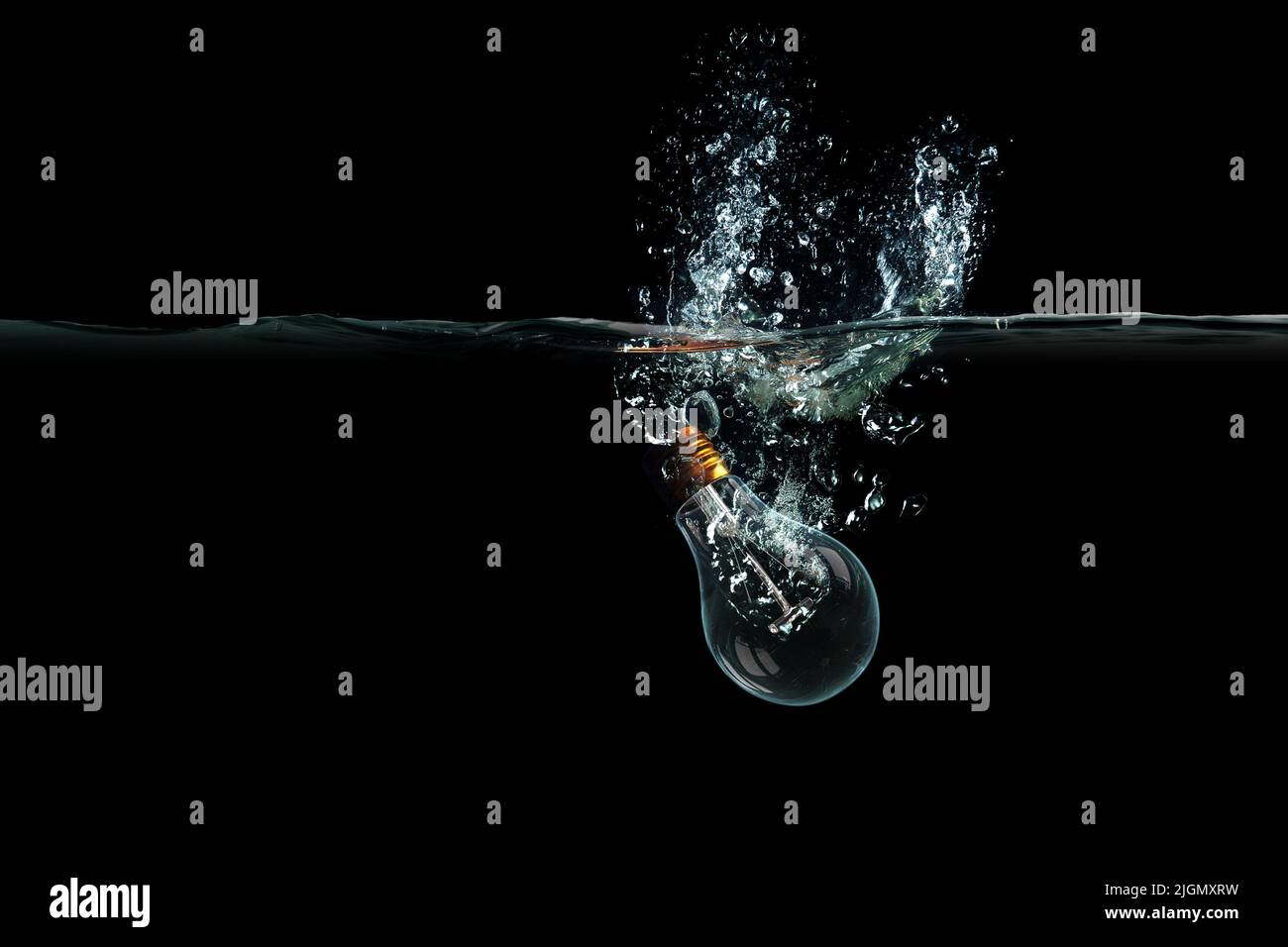 Creative water splash on a Led bulb Stock Photo - Alamy