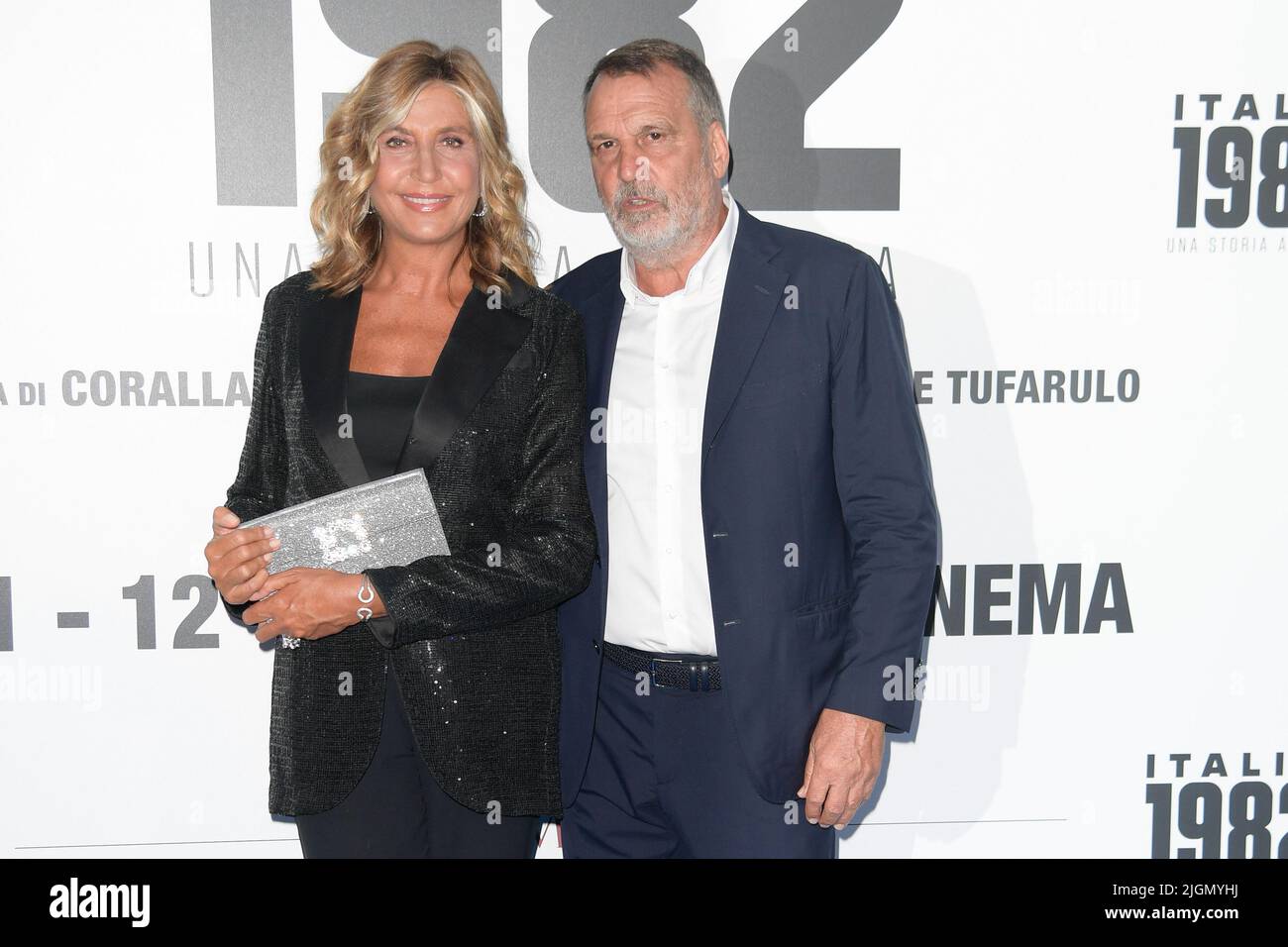 Myrta Merlino (left) and Marco Tardelli (right) attend the blu carpet ...