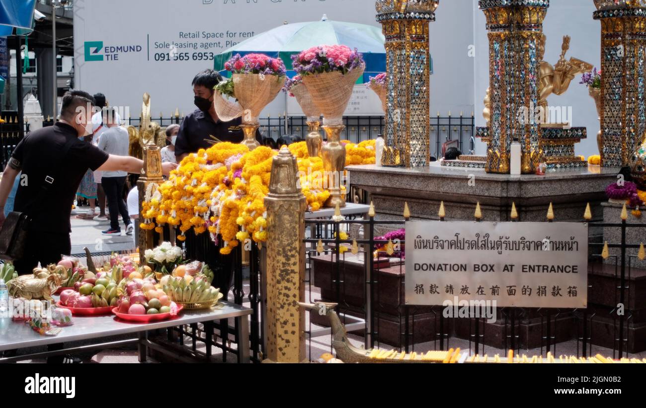 People at the Erawan Shrine, aka the Thao Maha Phrom Shrine at ...