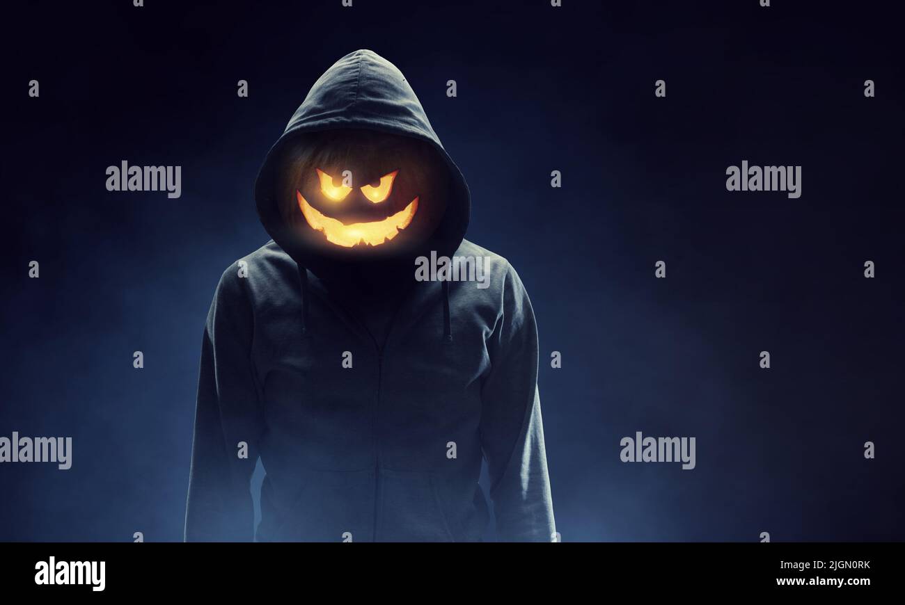 Scary and creepy male monster with gouged eyes looking like a skull ...