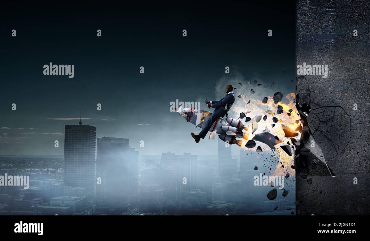 Determined businessman on his way to success leaving fire trails Stock ...