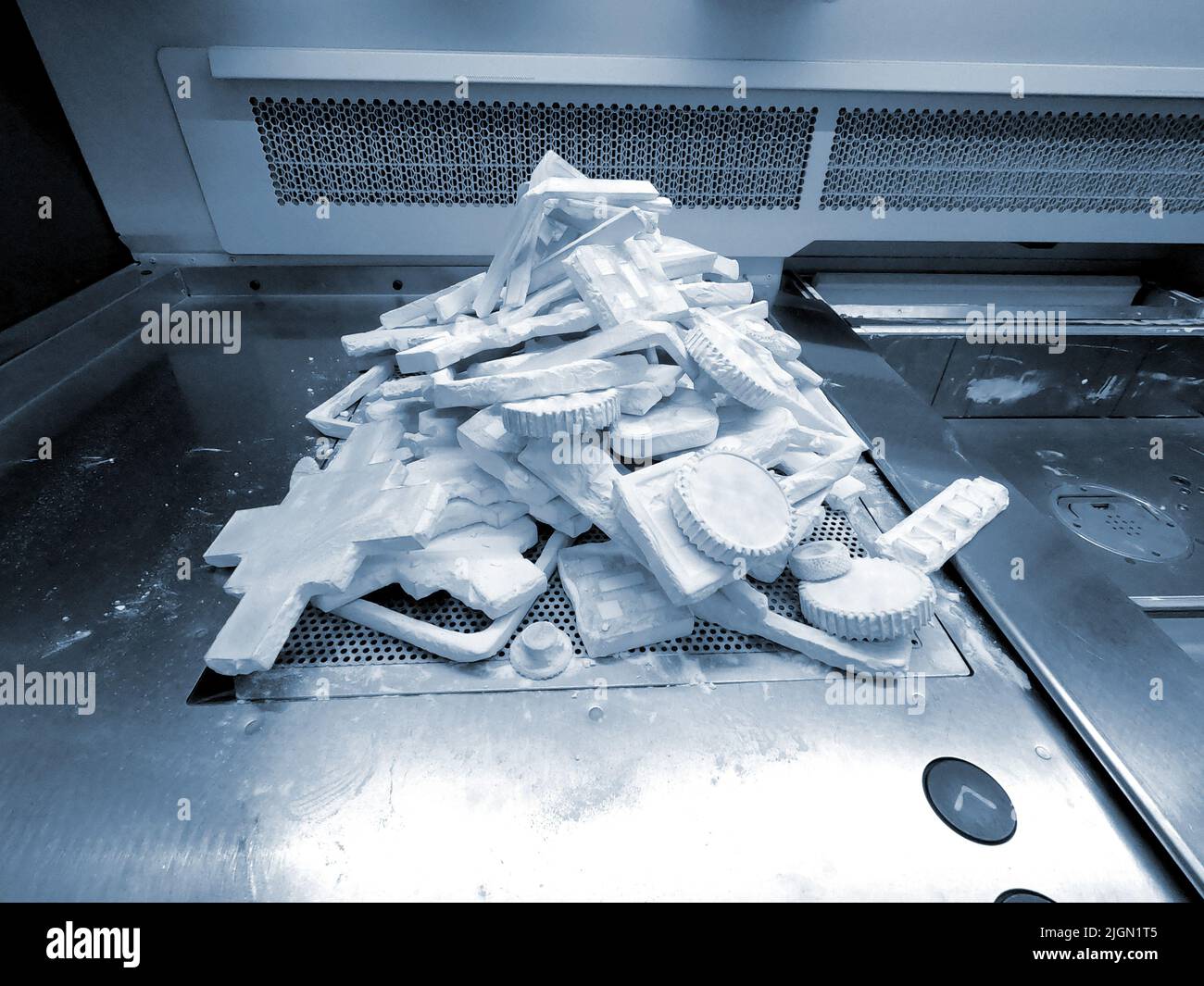 Objects and models printed on industrial 3D printer from white plastic ...