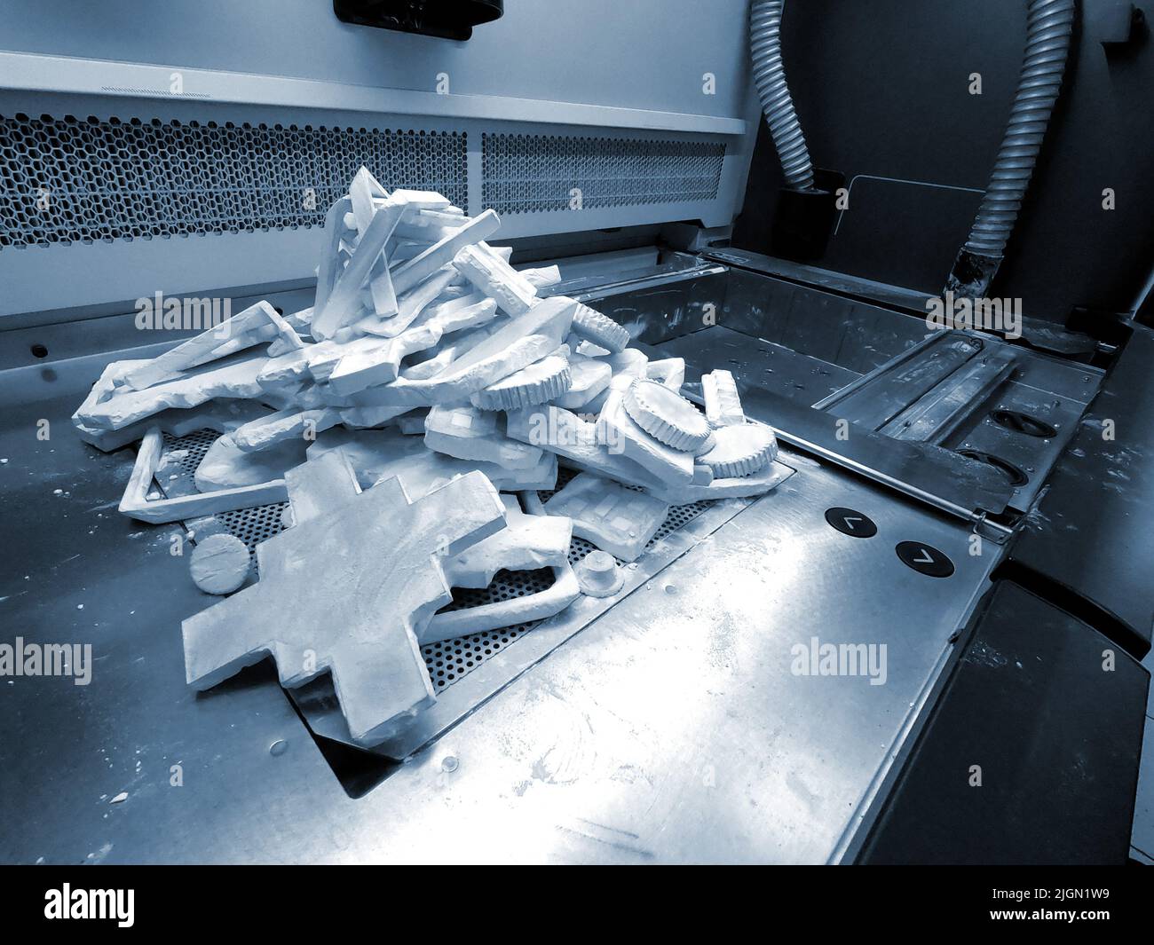 Objects and models printed on industrial 3D printer from white plastic ...