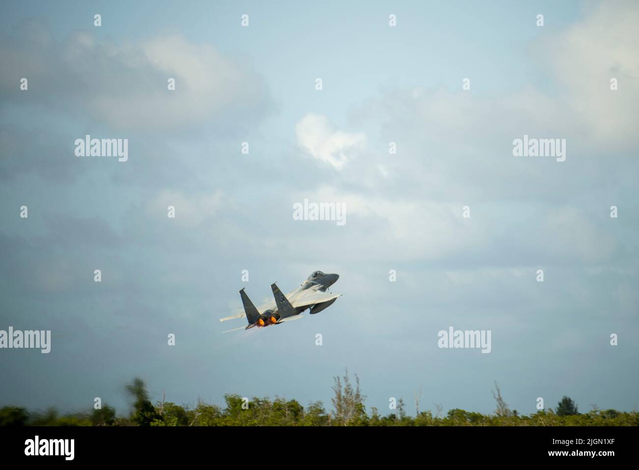 A U.S. Air Force F-15C Eagle flies above Muniz Air National Guard Base ...