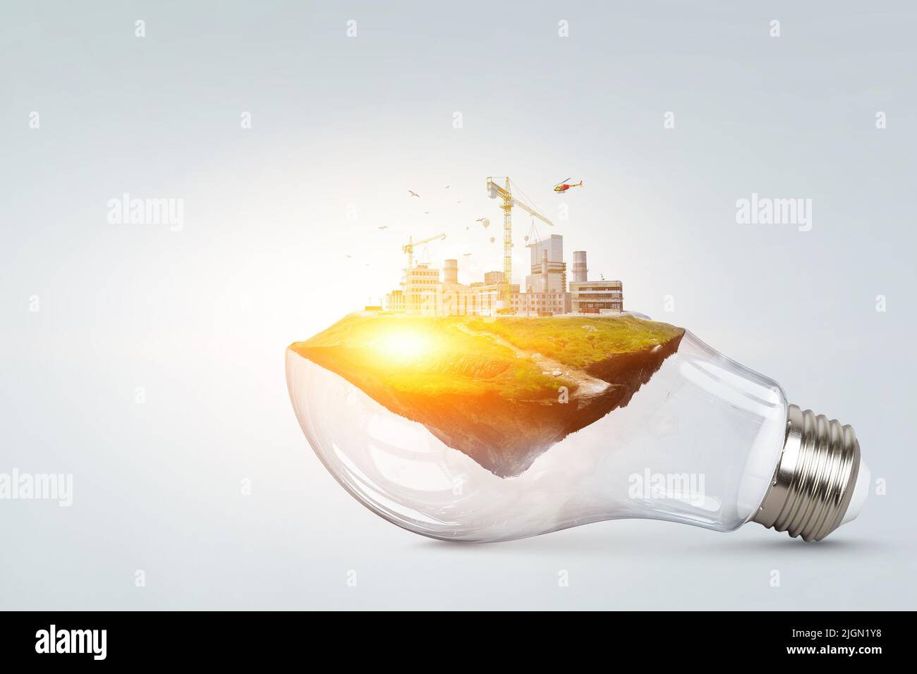 City construction inside light bulb Stock Photo - Alamy