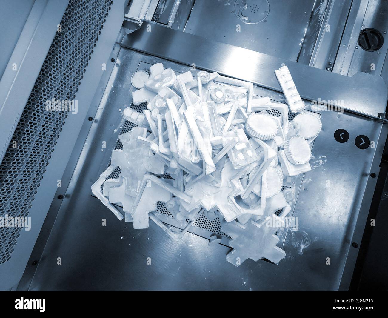 Objects and models printed on industrial 3D printer from white plastic ...