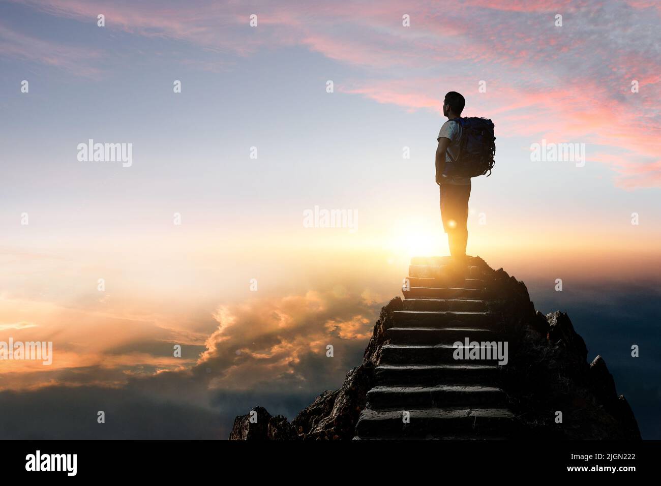 Traveler exploring high mountain summit hi-res stock photography and ...