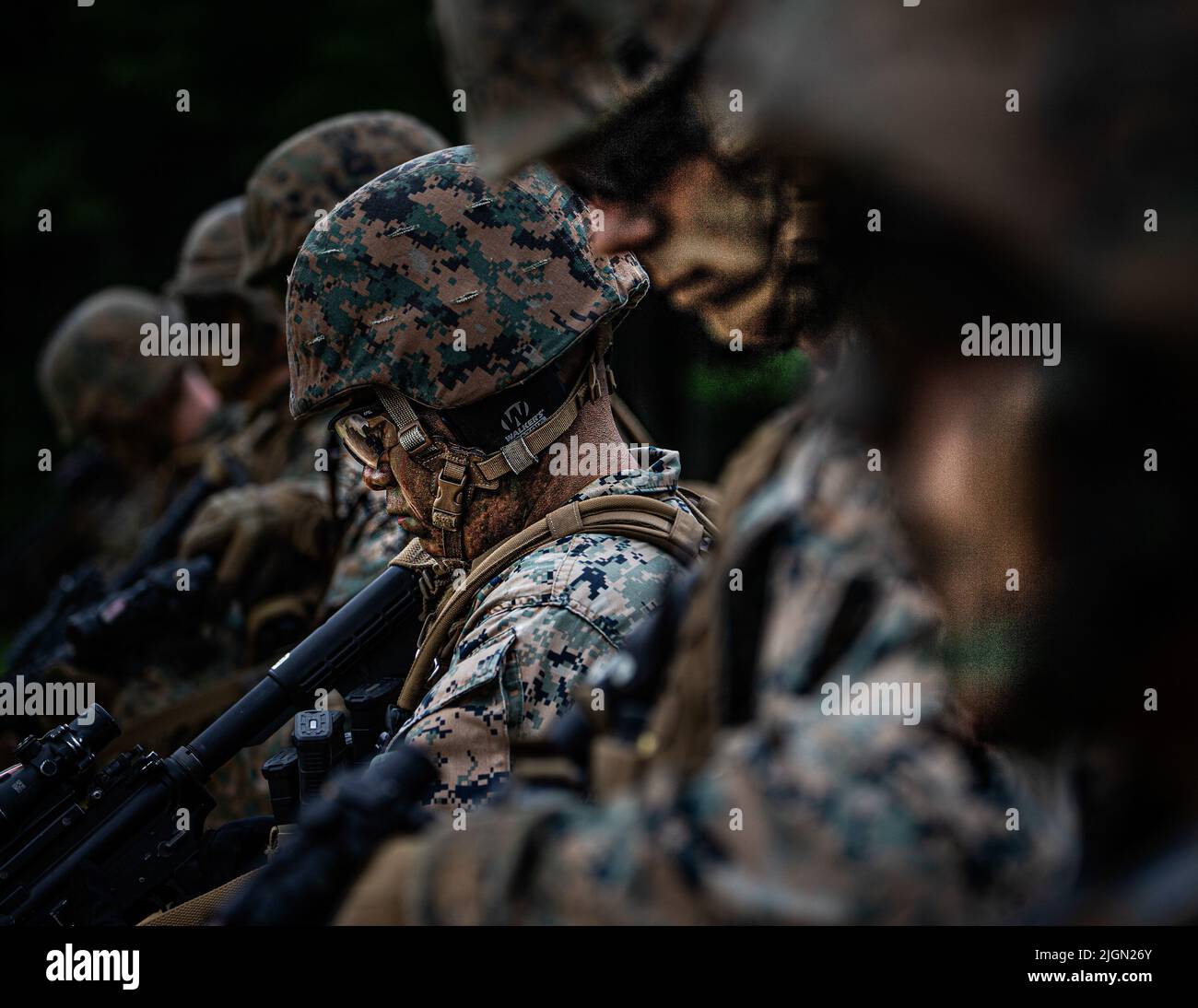 Marines with Guard Company, Marine Barracks Washington, reload weapons ...