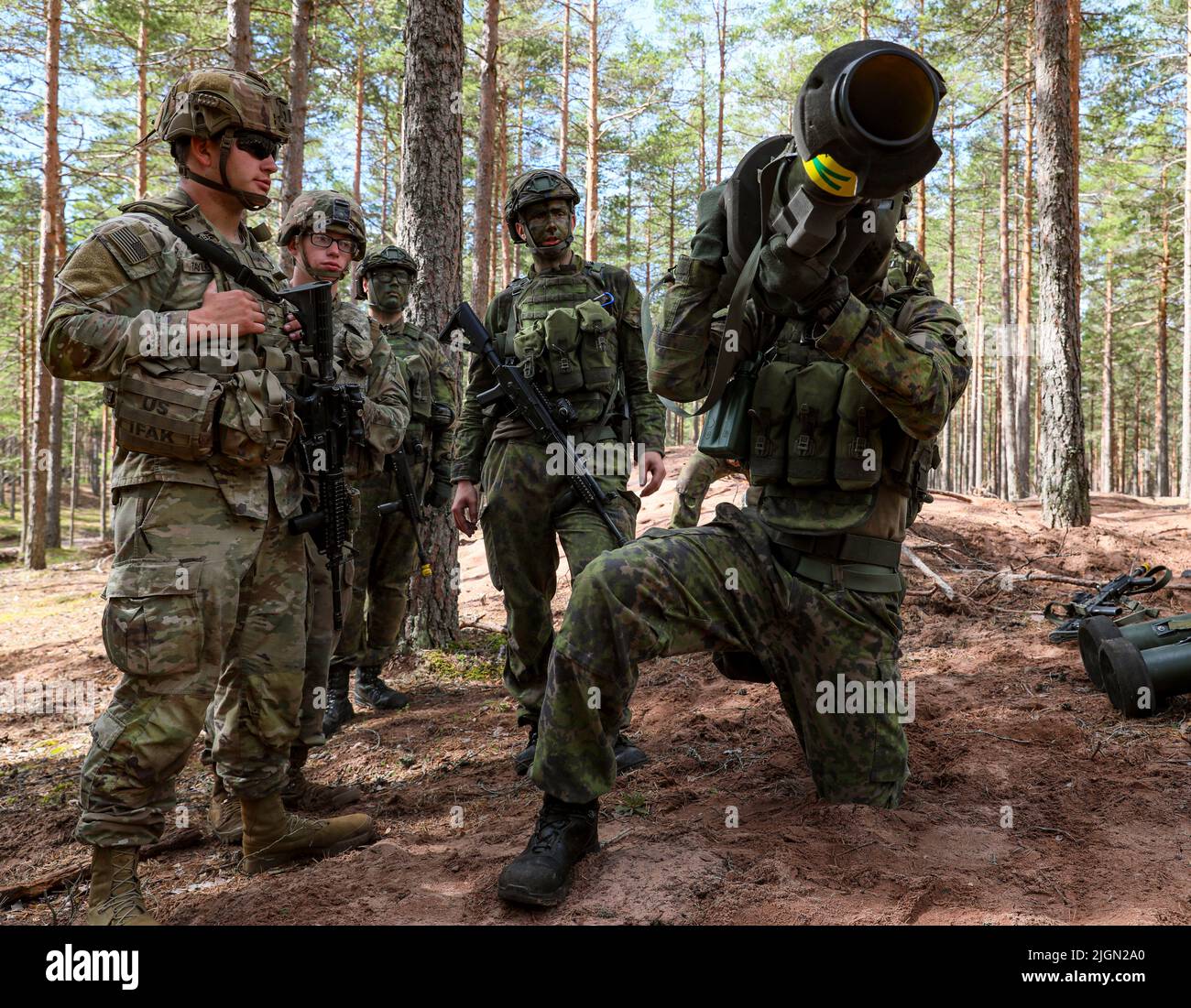 Finnish soldiers assigned to the Satakunta Jaeger Battalion, and U.S ...