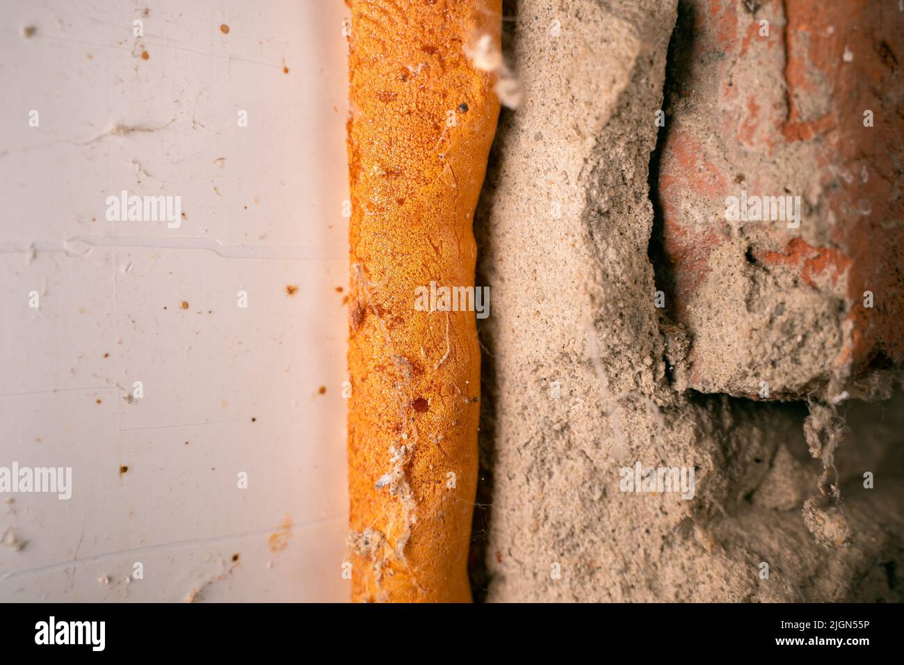 Old polyurethane foam close-up. Corrosion and destruction of building ...