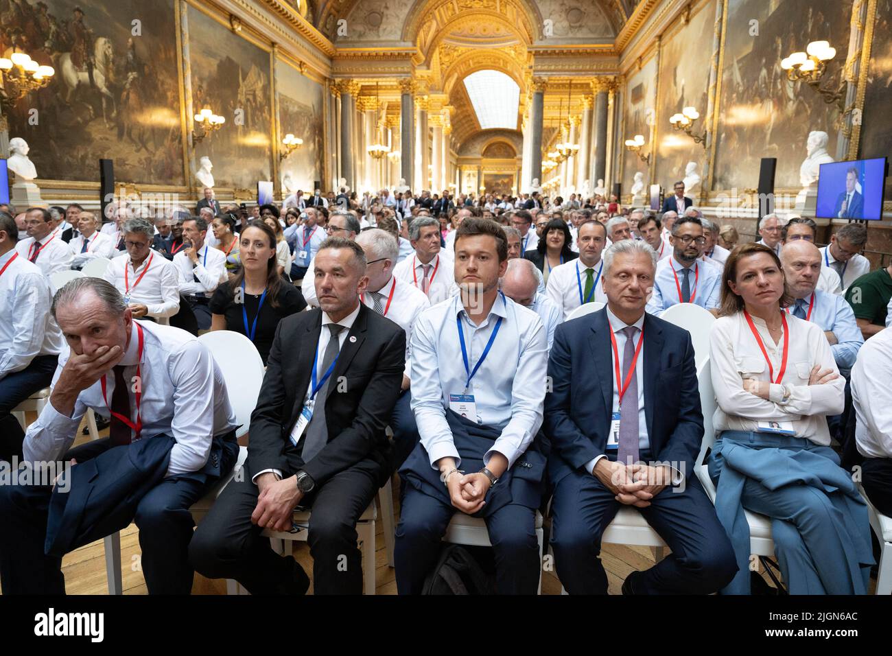 Business men during the 5th Choose France summit on July 11, 2022 in ...