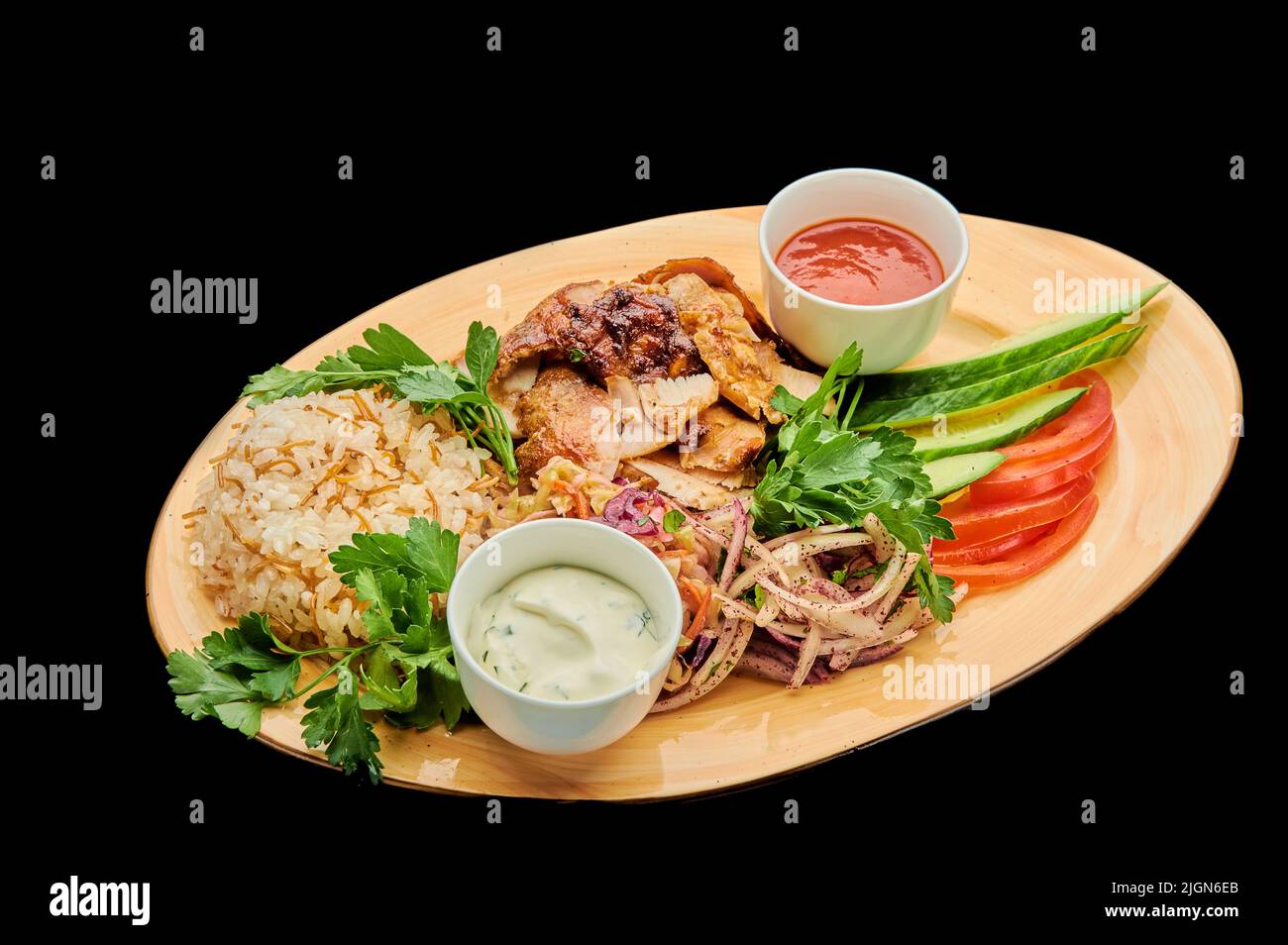 Open chicken shawarma with Turkish rice on a black isolated background ...