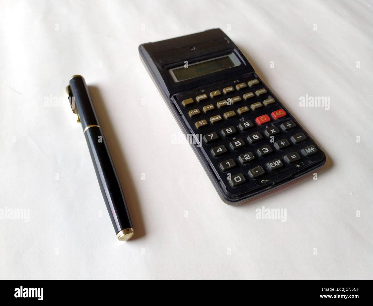 Scientific Calculator isolated on white background Stock Photo - Alamy