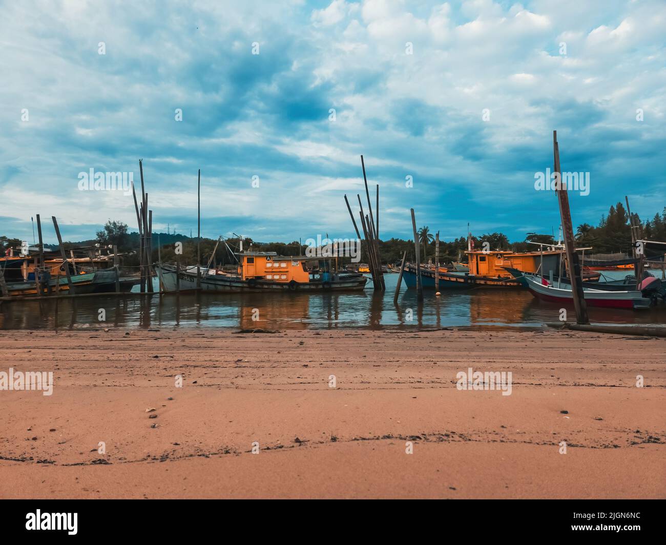 Fisherman village during sunset in Kuantan, Pahang Stock Photo - Alamy