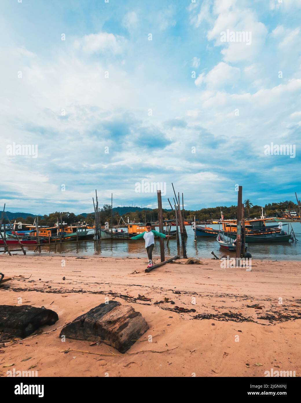 Sunset time at the fisherman village with full of boats Stock Photo - Alamy