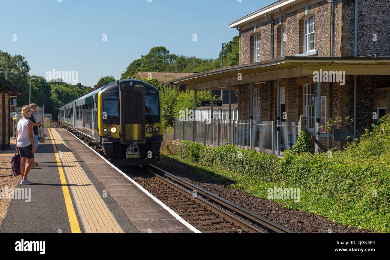 Micheldever, Hampshire, England, UK. 2022, Rail passengers waiting on ...