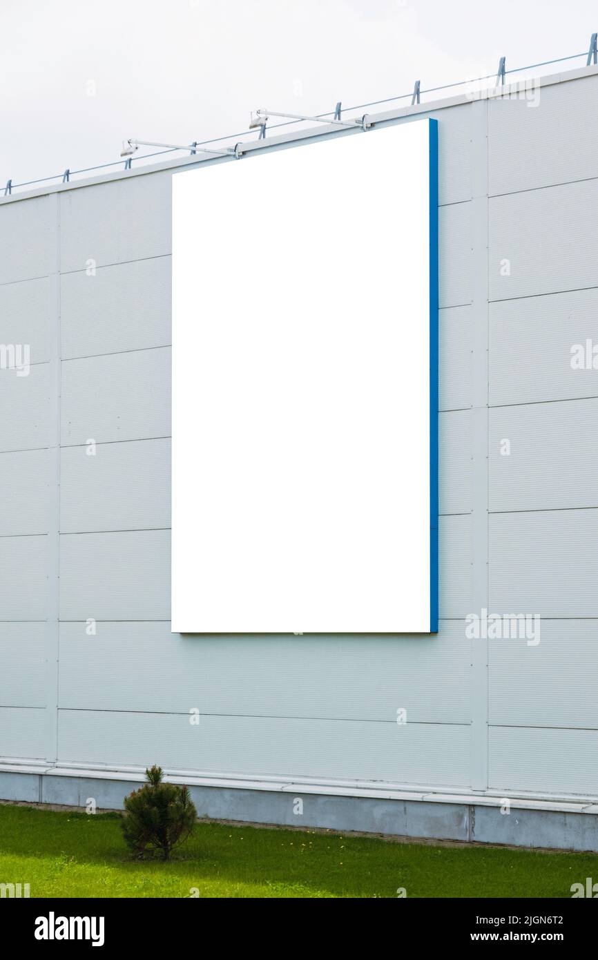 Mock up template. Big vertical white blank signboard, advertising ...