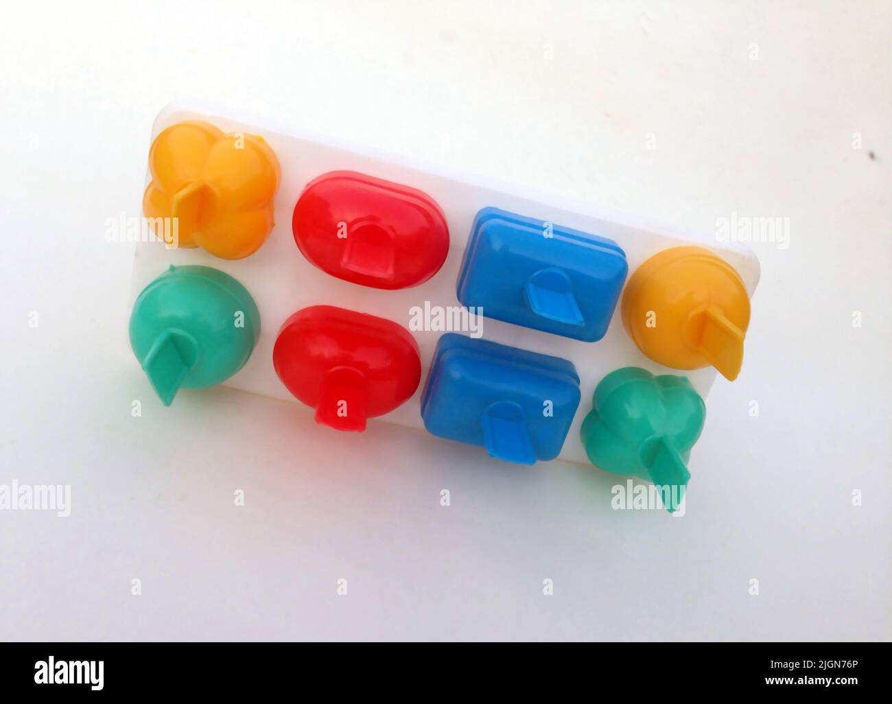 colorful plastic ice cream maker isolated on white background Stock ...