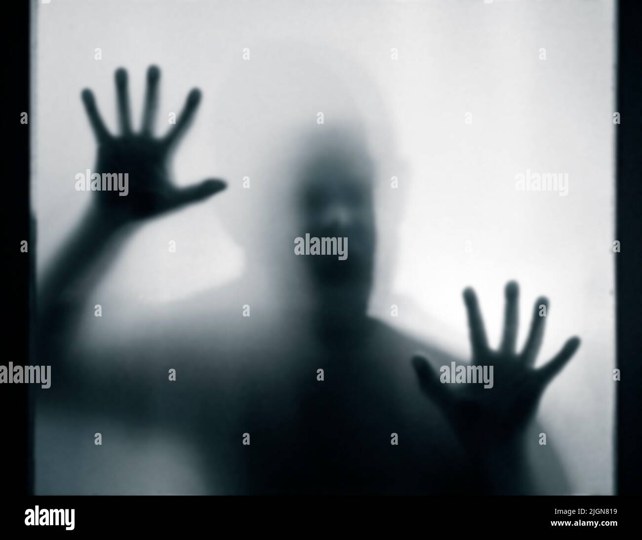 Horror, halloween background - Shadowy figure behind glass of a man ...