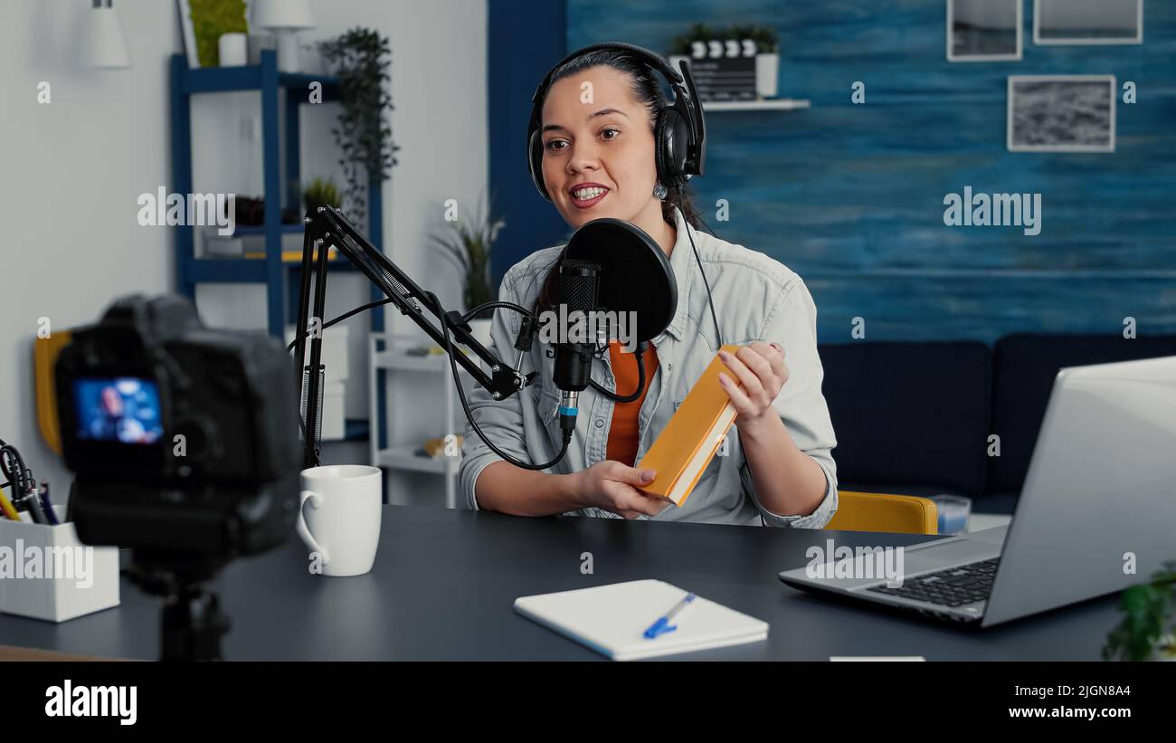 Creative digital content creator recording agenda review while in home ...