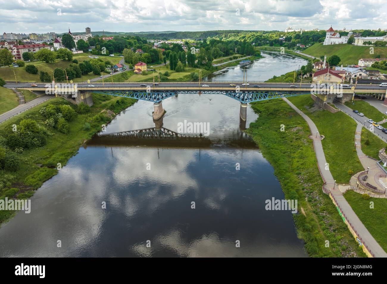 aerial view from great height on wide river and huge bridge of old city ...