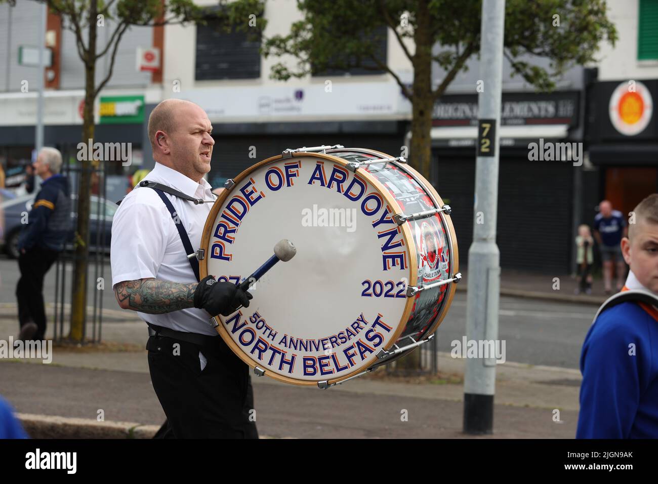 Members of a Protestant loyalist order, Pride of Ardoyne, take part in ...