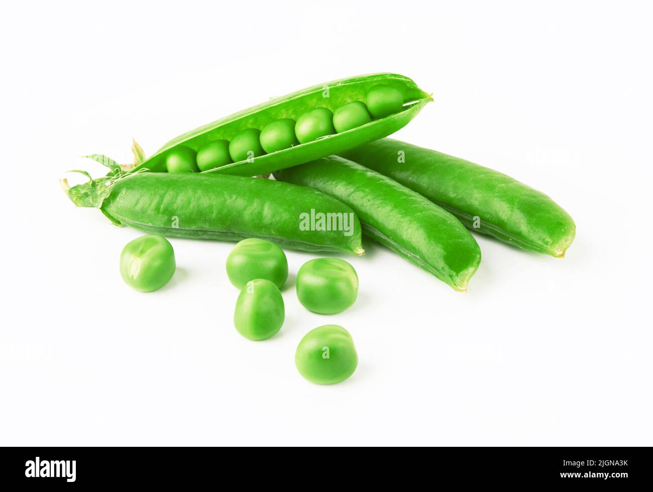 Fresh green peas isolated on white background Stock Photo - Alamy