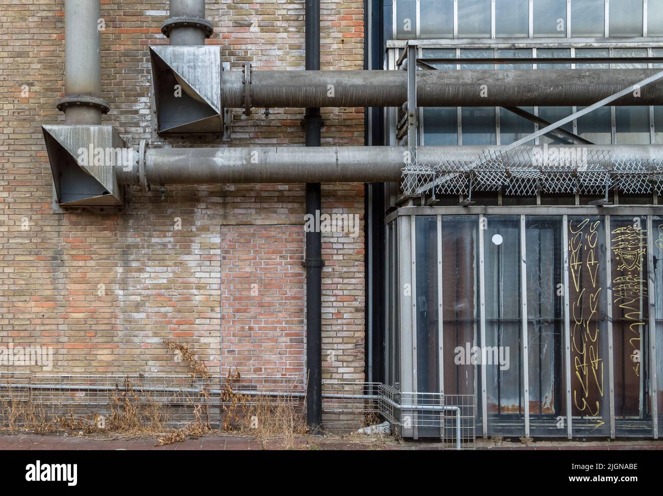 Industrialised wall with vents Stock Photo - Alamy