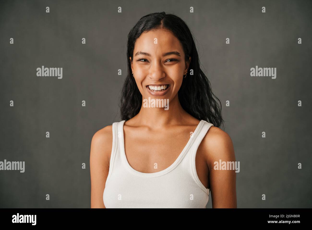 Smiling biracial beautiful young hi-res stock photography and images ...