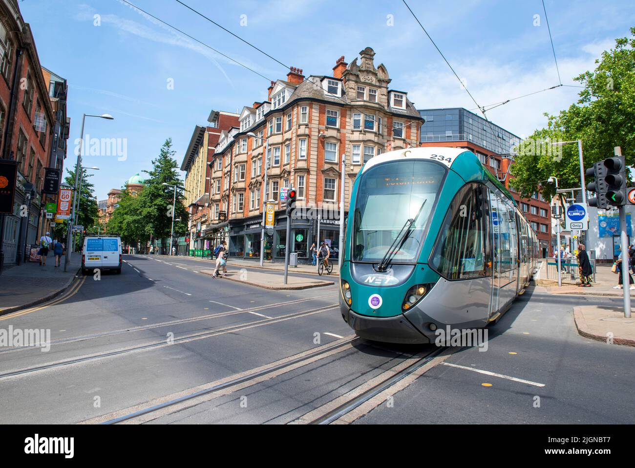 Tram leaving the Theatre Royal Stop and crossing Upper Parliament ...