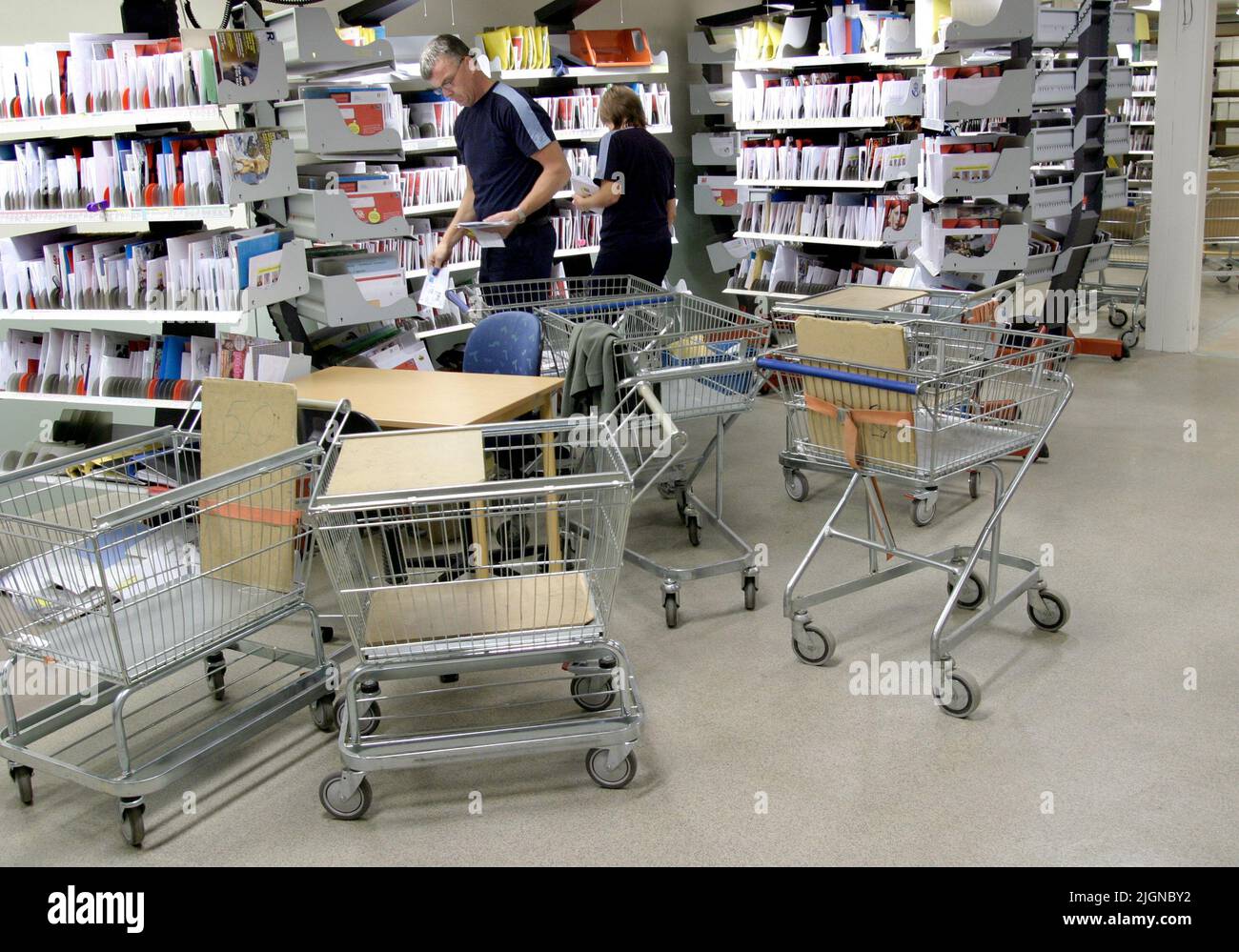 Postman at the Swedish postal service who handles letters and mail to ...