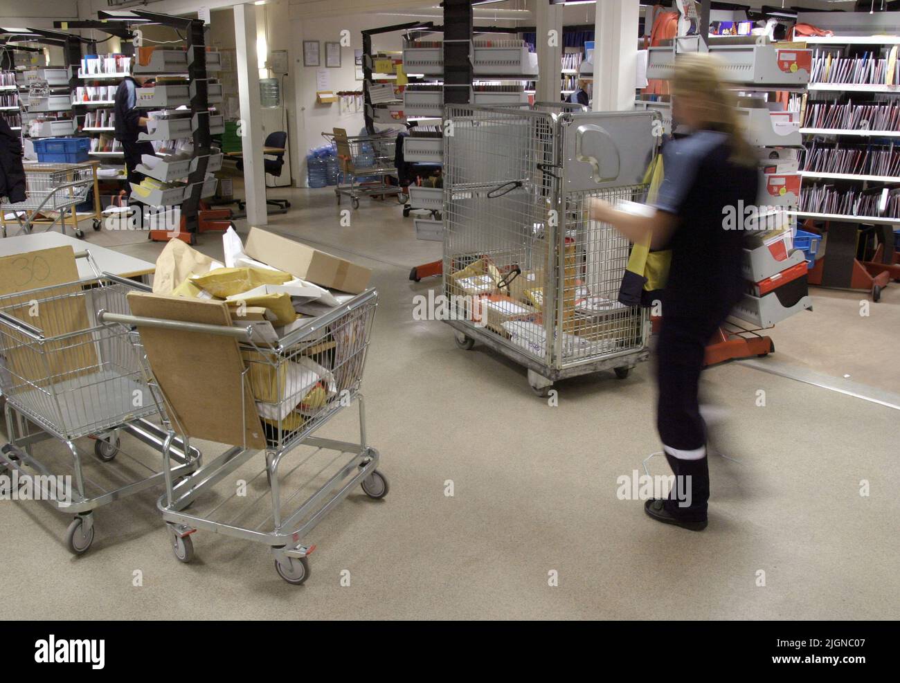 Postman at the Swedish postal service who handles letters and mail to ...