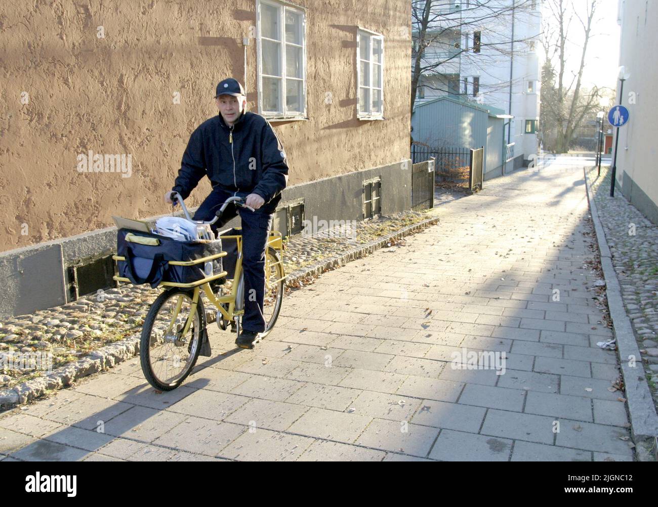 Postman at the Swedish postal service who handles letters and mail to ...