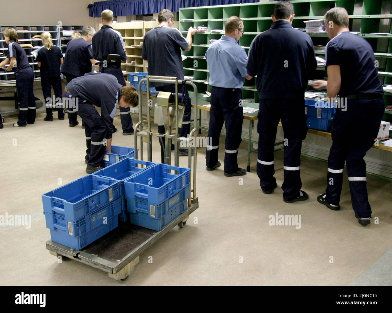 Postman at the Swedish postal service who handles letters and mail to ...