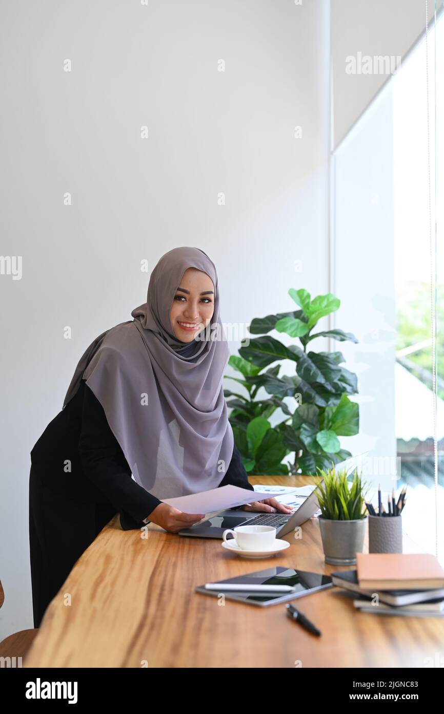 Confident muslim office lady hi-res stock photography and images - Alamy