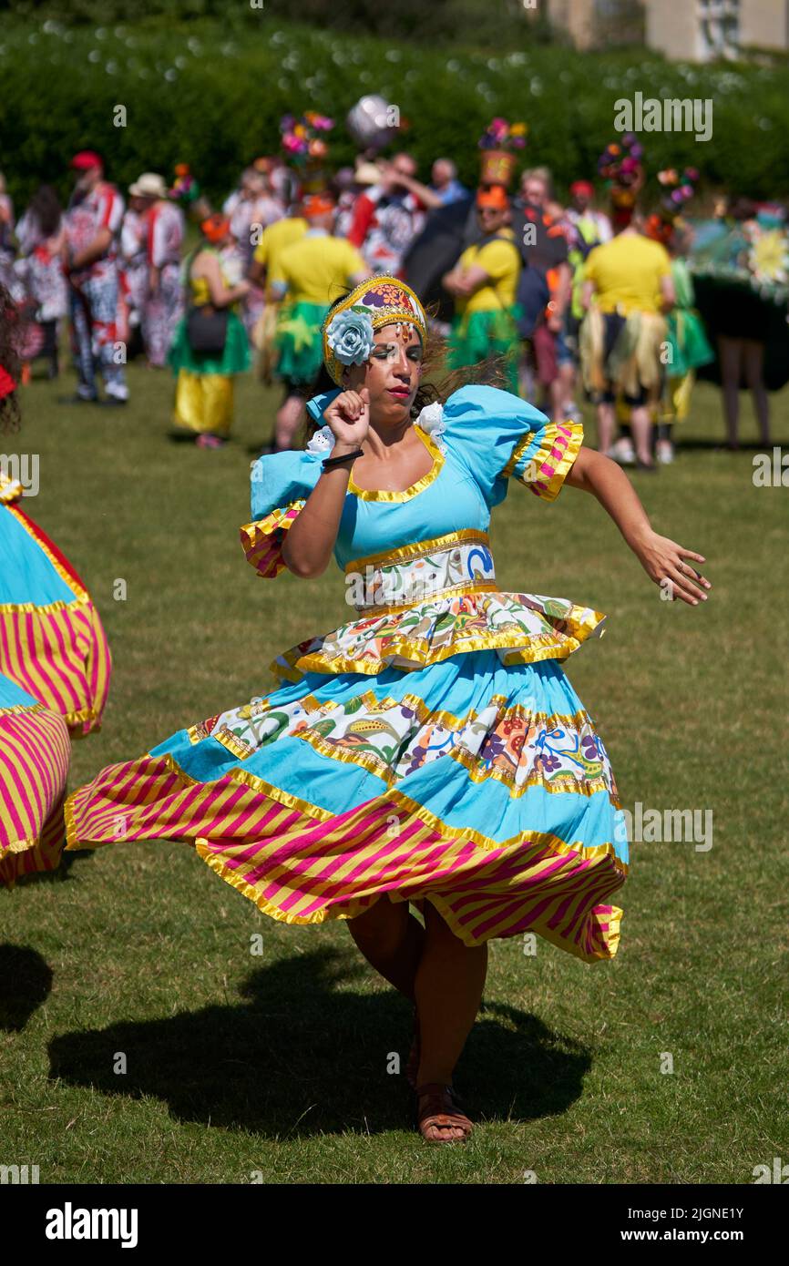 Dancers in ornate costumes performing at the annual carnival as it ...