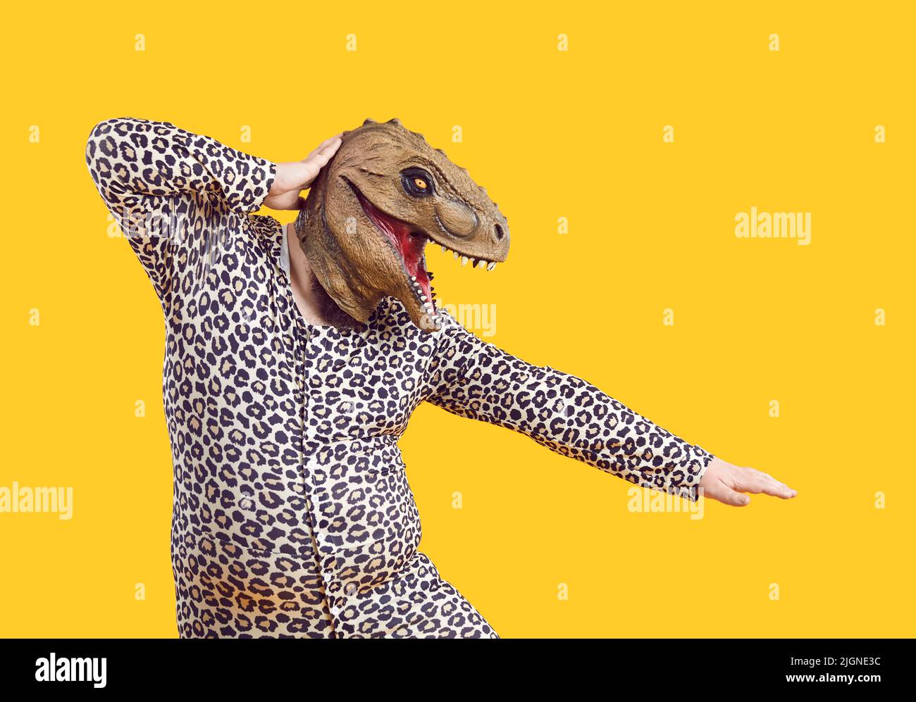 Funny eccentric fat man dressed in leopard print pajamas dancing with ...