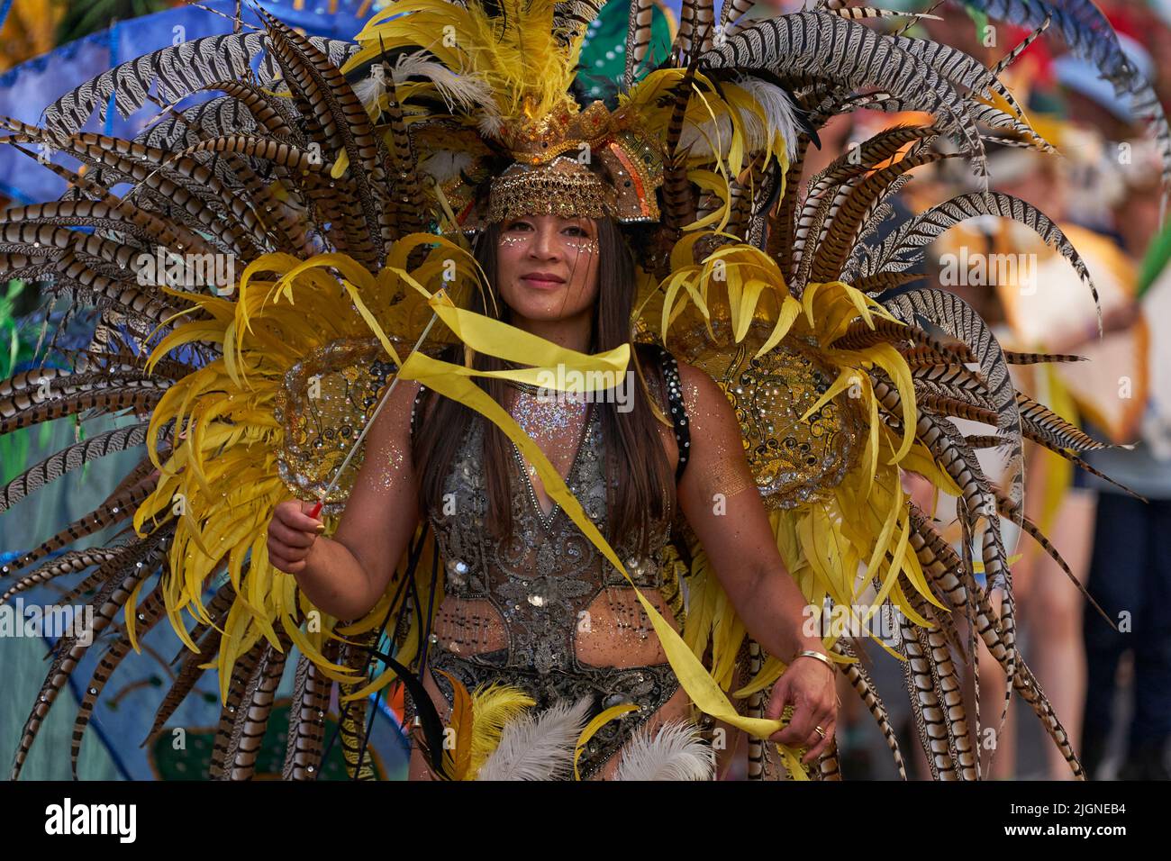 Dancers in ornate costumes performing at the annual carnival as it ...