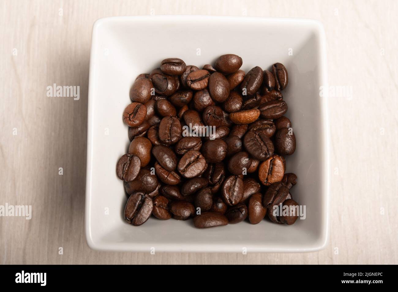 Dark brown coffee beans square hi-res stock photography and images - Alamy