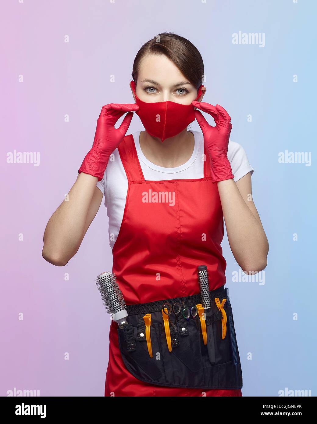 hairdresser girl in red mask and gloves Stock Photo - Alamy