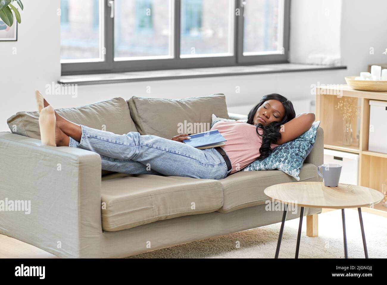 Beautiful woman book sleeping hi-res stock photography and images - Alamy