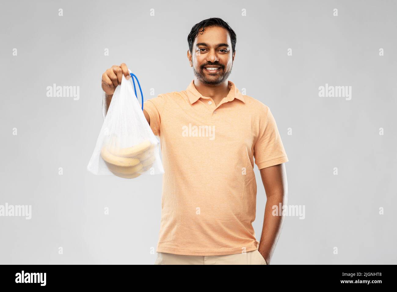 Young guy holding reusable hi-res stock photography and images - Alamy