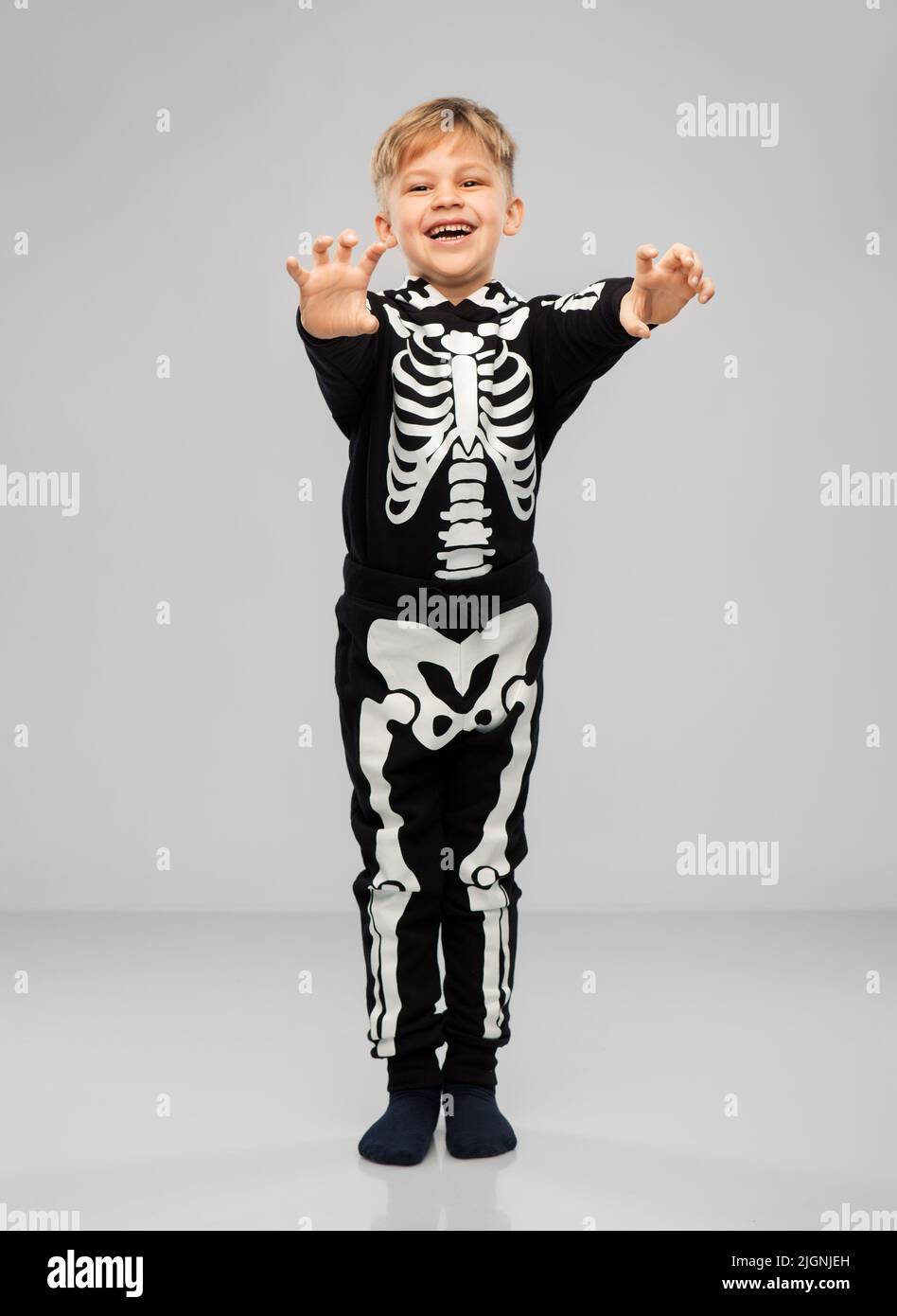 boy in halloween costume of skeleton making faces Stock Photo - Alamy