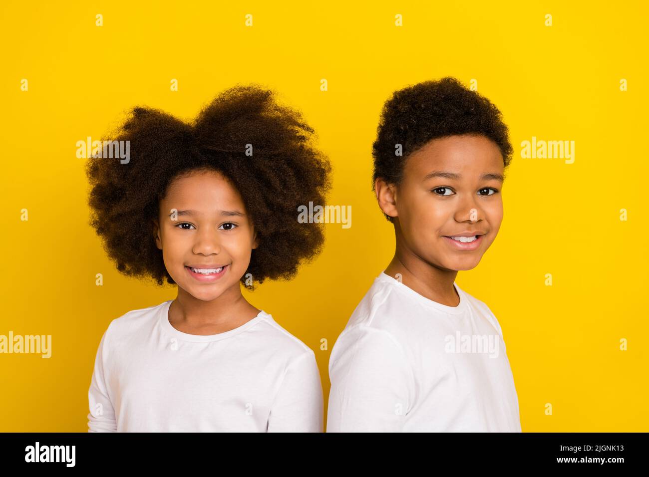 Photo of two cheerful friendly people beaming smile look camera ...