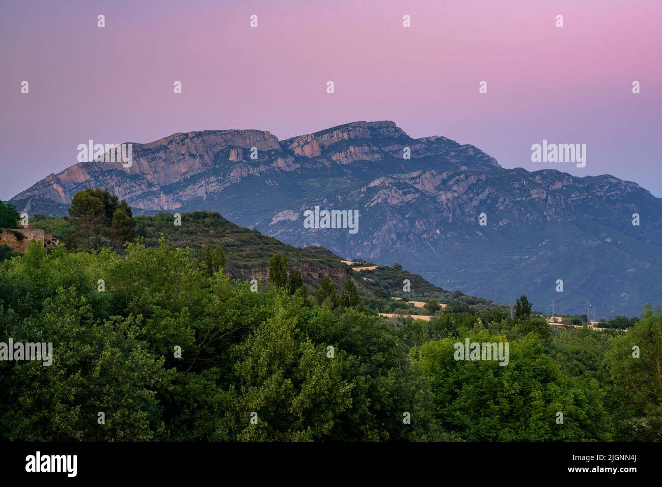 Àger village and the Montsec range at sunset, twilight and night (La ...