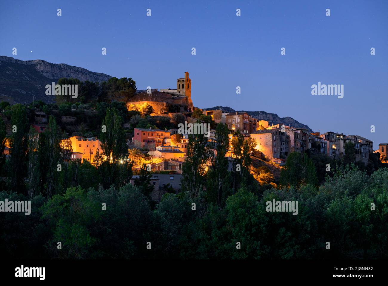 Àger village and the Montsec range at sunset, twilight and night (La ...